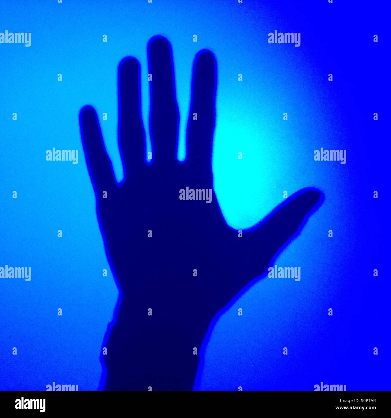 Main bleue Banque de photographies et d’images à haute résolution - Alamy