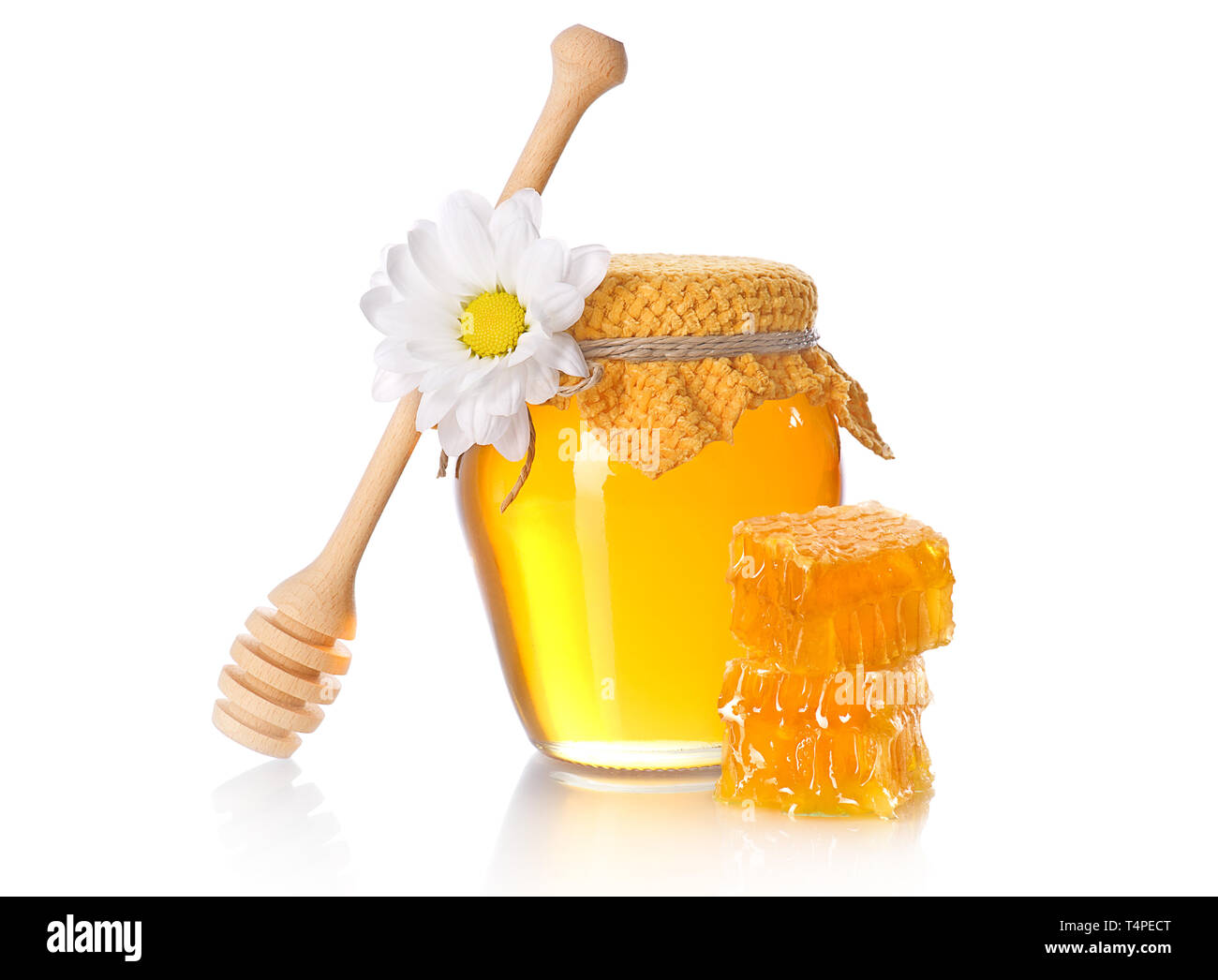 Pot de miel Le miel avec balancier et une pile de coupes d'abeilles sur ...