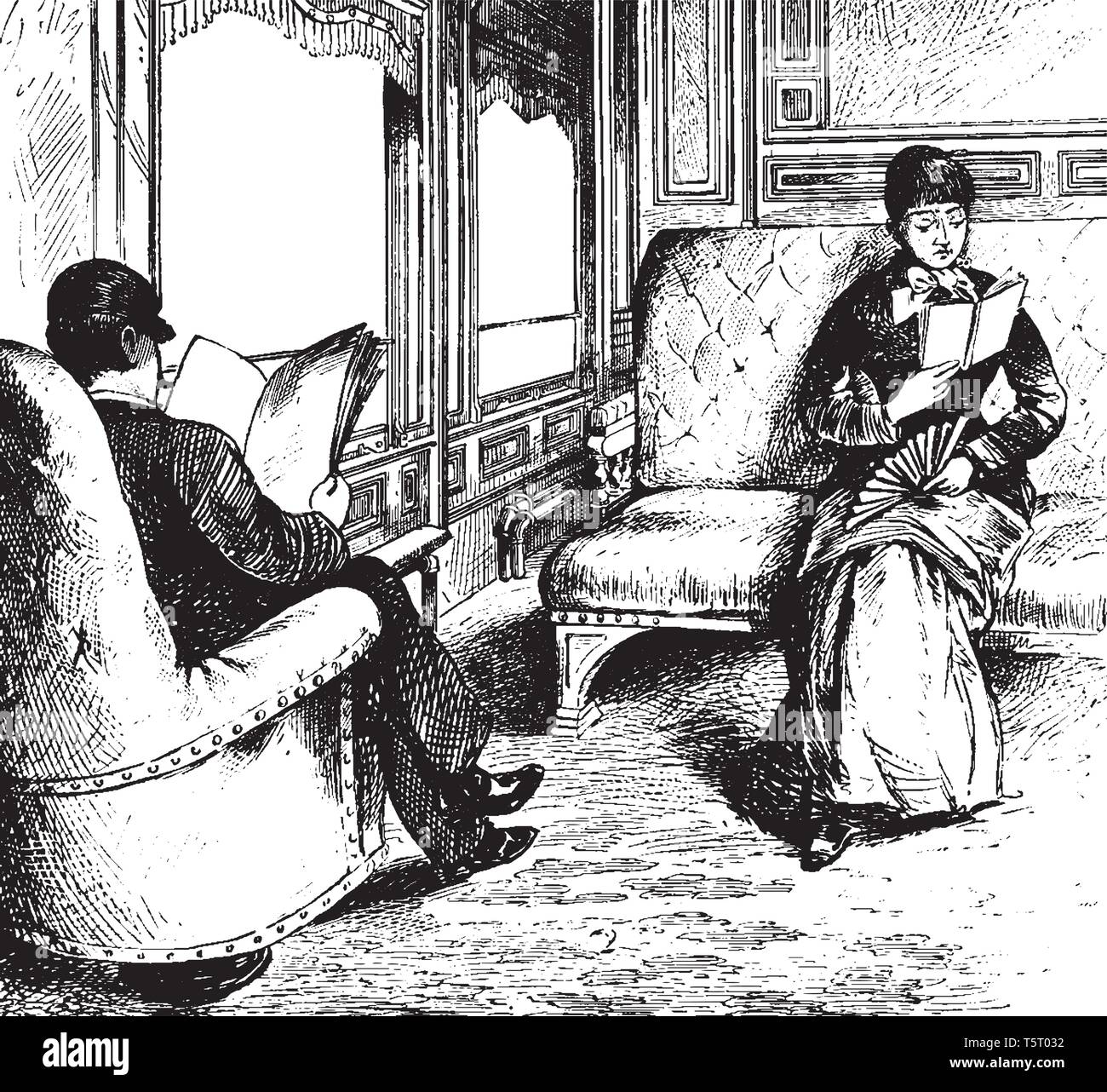 Compartiment de train où un homme et une femme lisant dans un ...