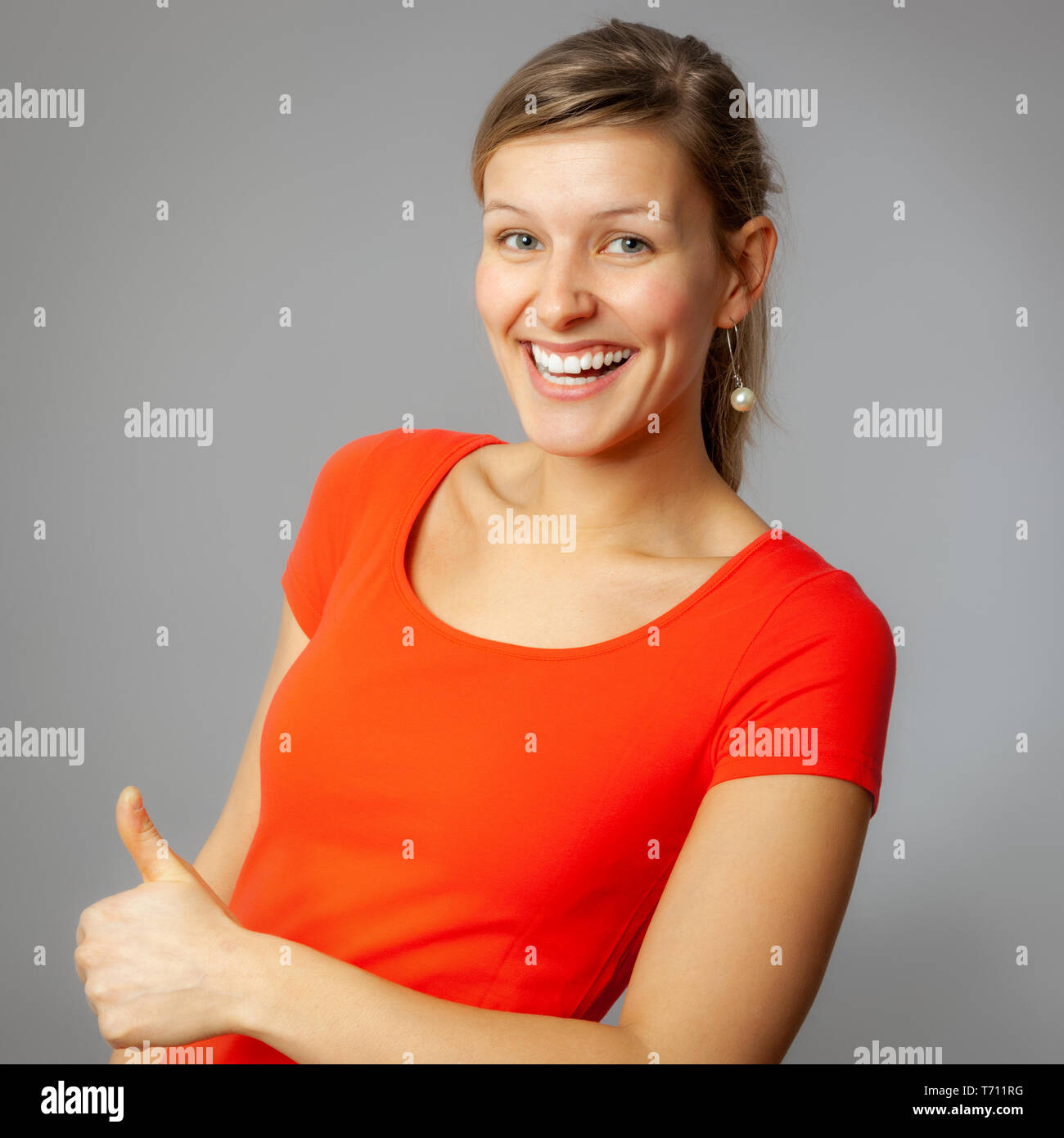 Femme sympathique Banque de photographies et d’images à haute ...