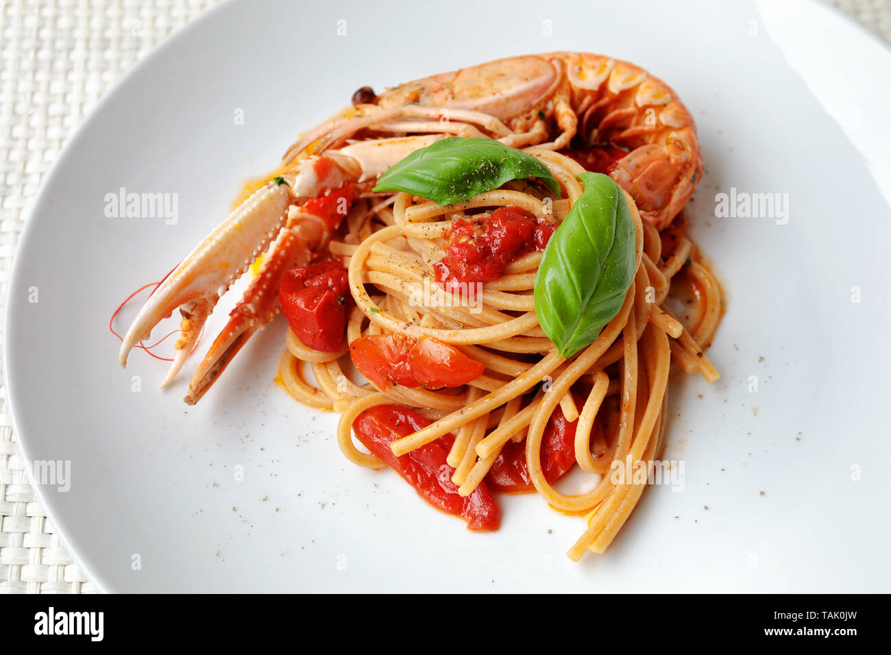 Manger des spaghettis Banque de photographies et d’images à haute ...