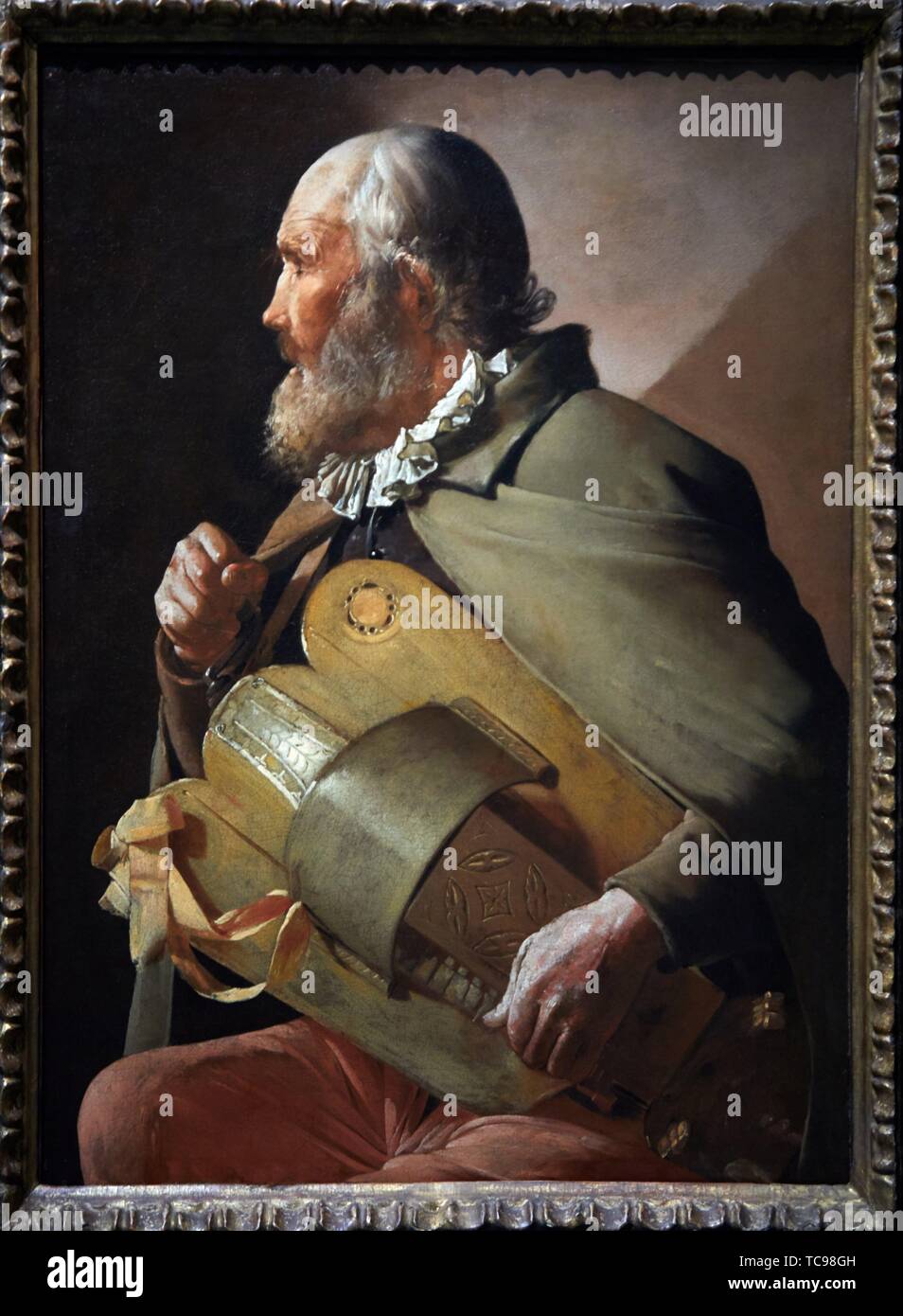 Georges de la tour blind hurdy gurdy player Banque de photographies et ...