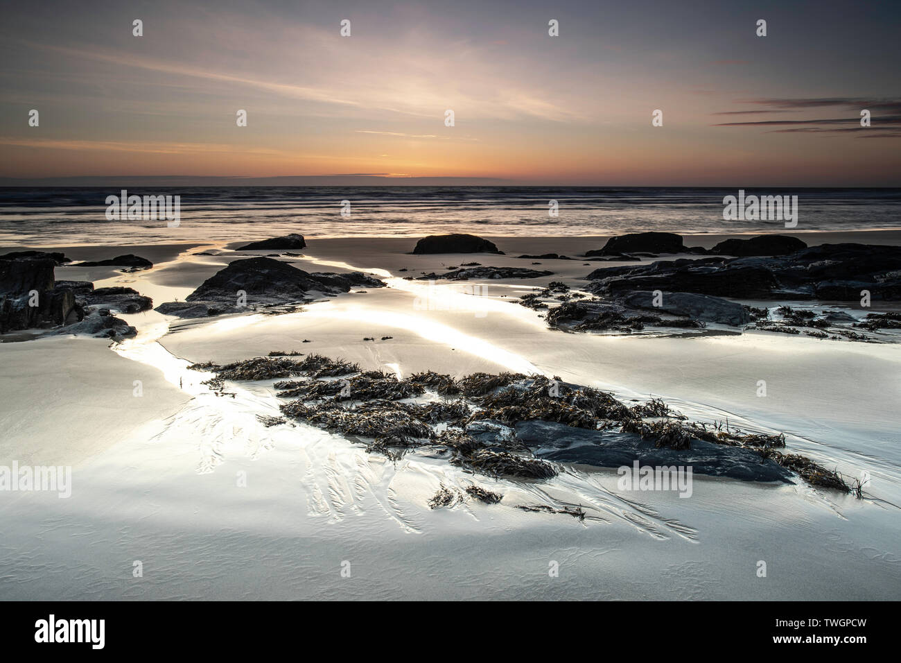 Plage de la baie de saligo Banque de photographies et d’images à haute résolution - Alamy
