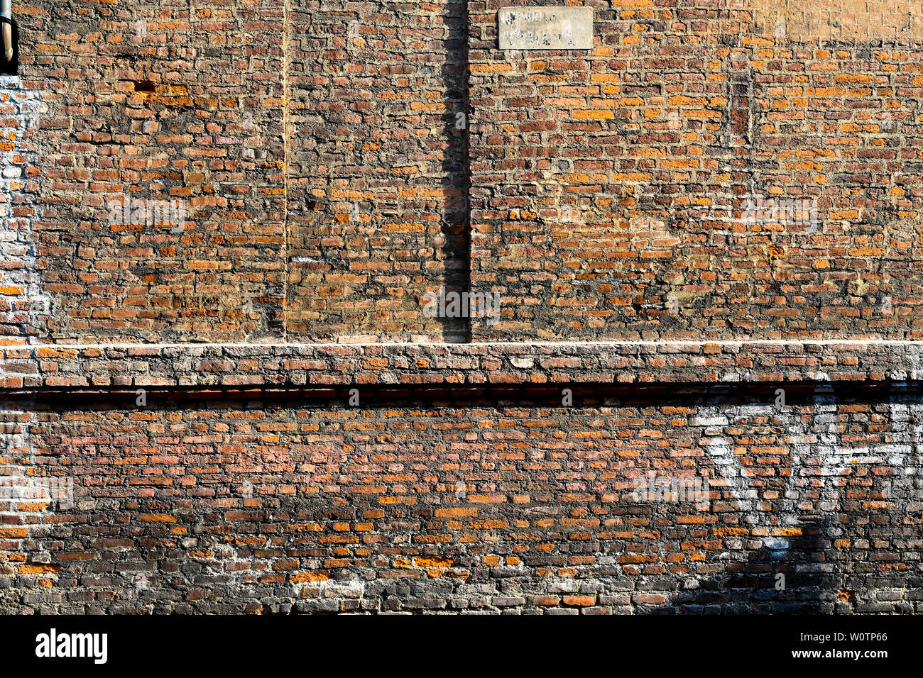 La texture de briques rouges. Les pierres décoratives. L'échelle ...