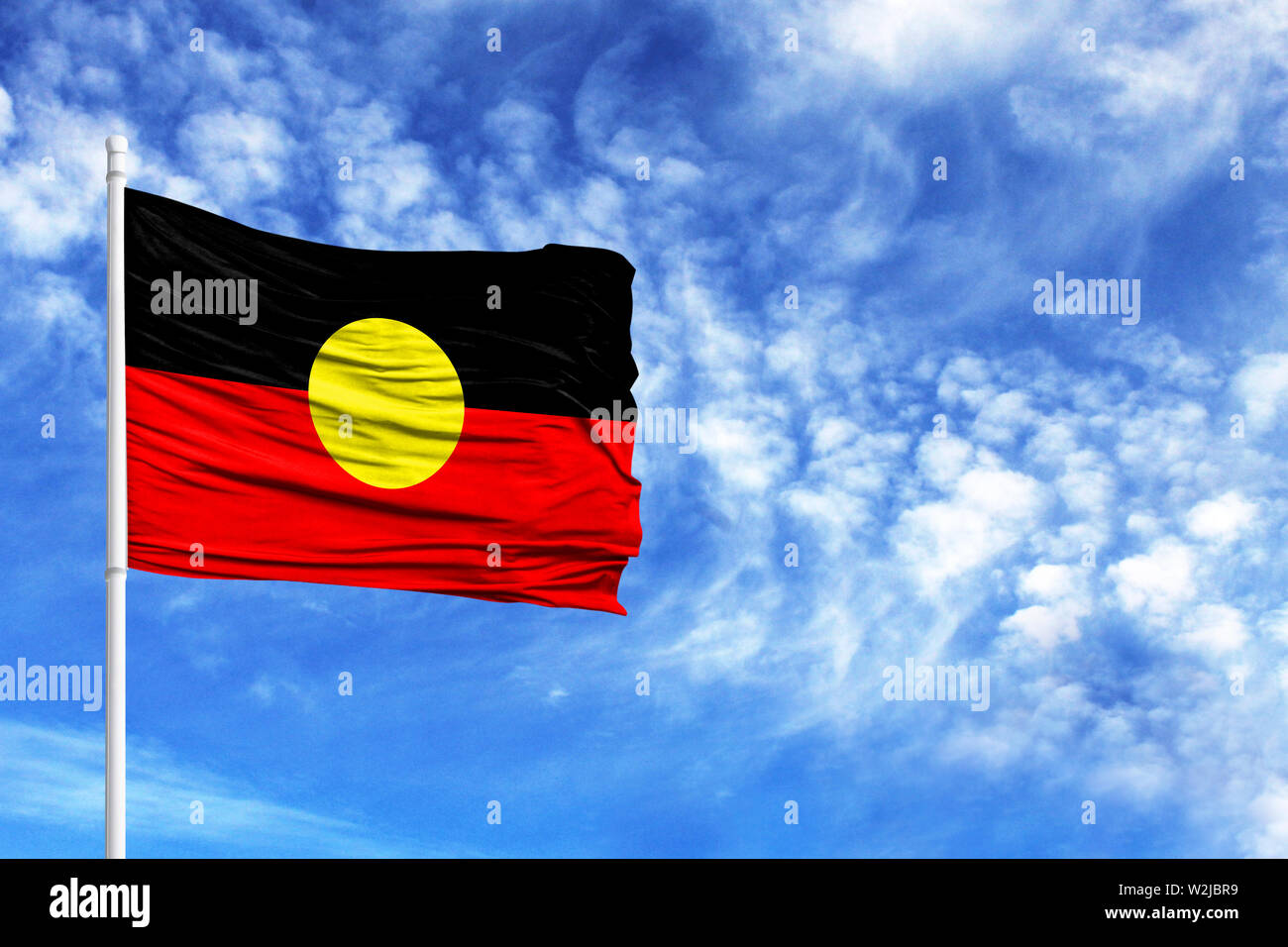 Drapeau autochtone contre le ciel bleu Banque de photographies et d ...