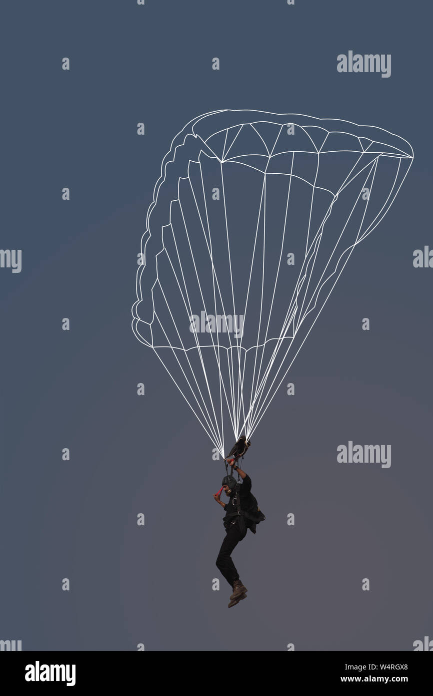 Un homme parapente Banque de photographies et d’images à haute ...
