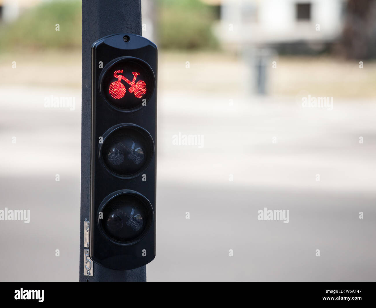 Traverser un feu rouge en velo Banque de photographies et d’images à ...