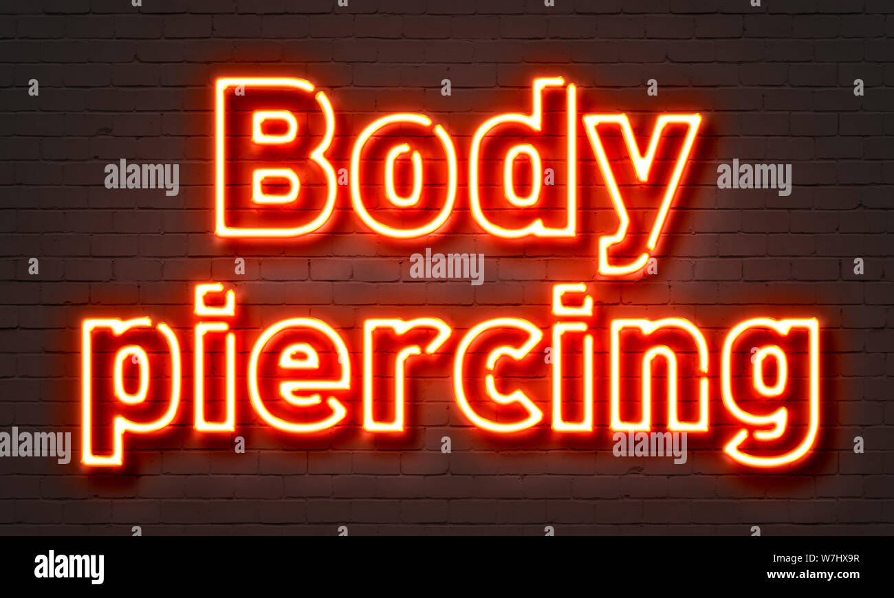Neon body piercing sign Banque de photographies et d’images à haute ...