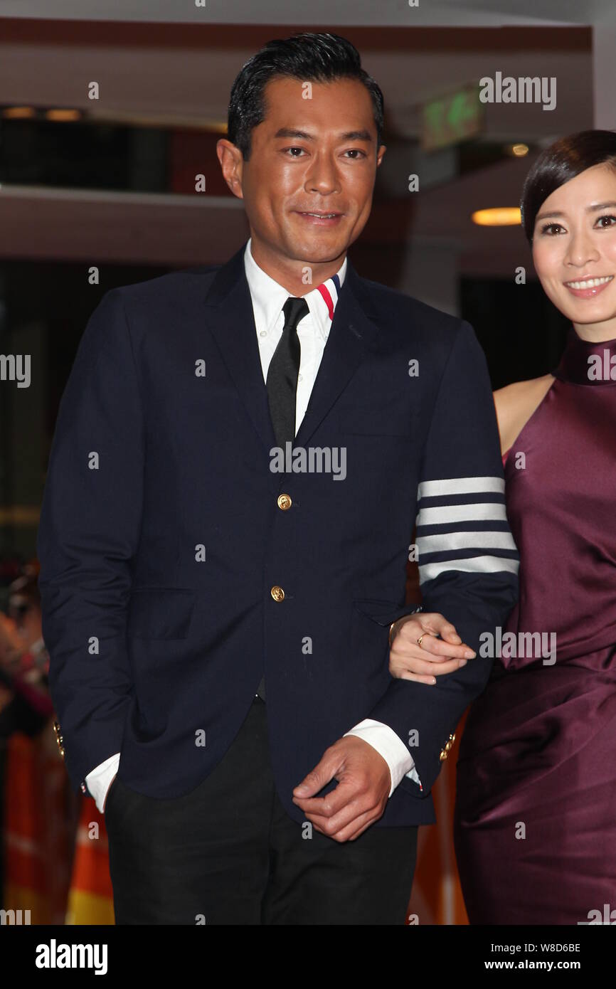 L'actrice de Hong Kong Charmaine Sheh, droite, et l'acteur Louis Koo posent sur le tapis rouge ...