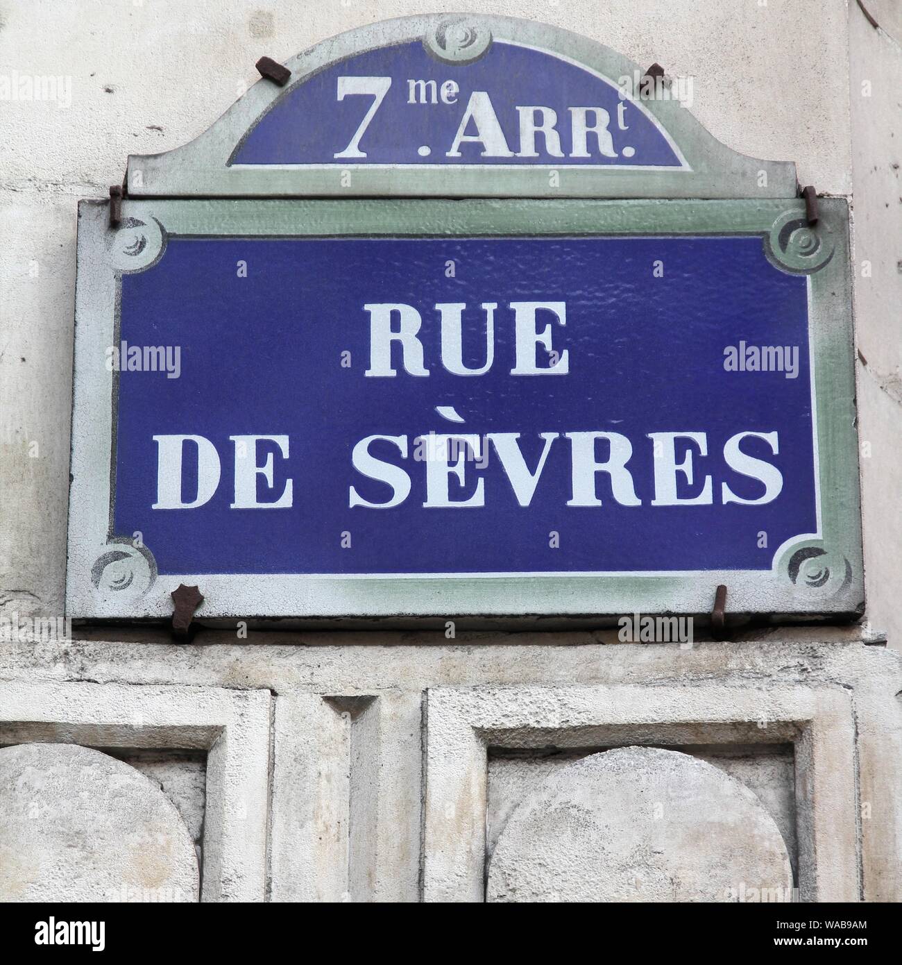 Paris, France - rue de Sevres street sign. Panneau bleu parisienne ...