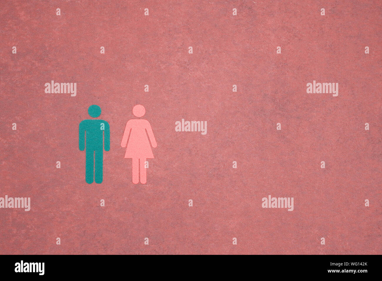 Pictogrammes masculin et féminin dessiné sur le mur Photo Stock - Alamy