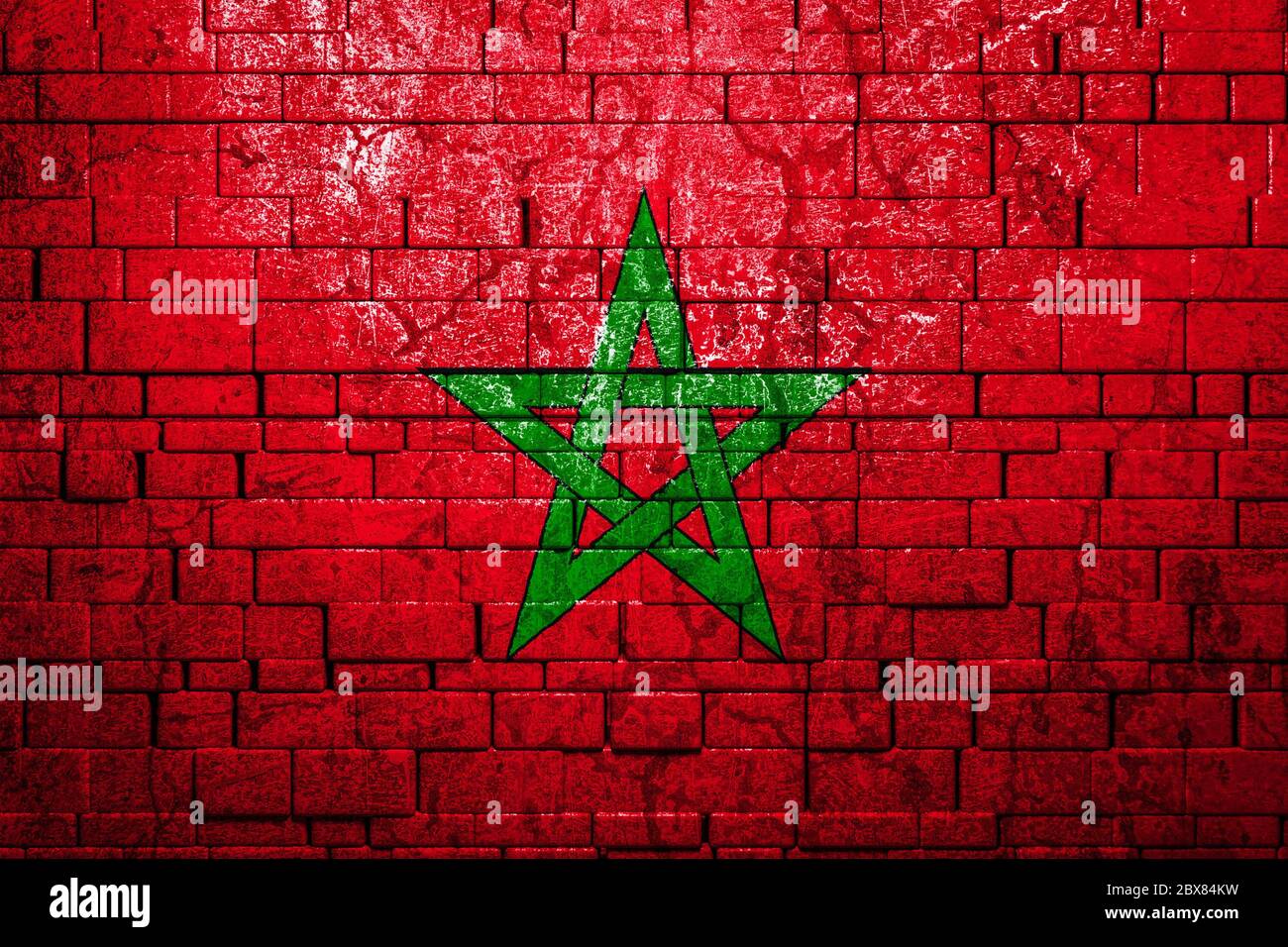 Bandiera nazionale del Marocco su muro di mattoni background.The ...