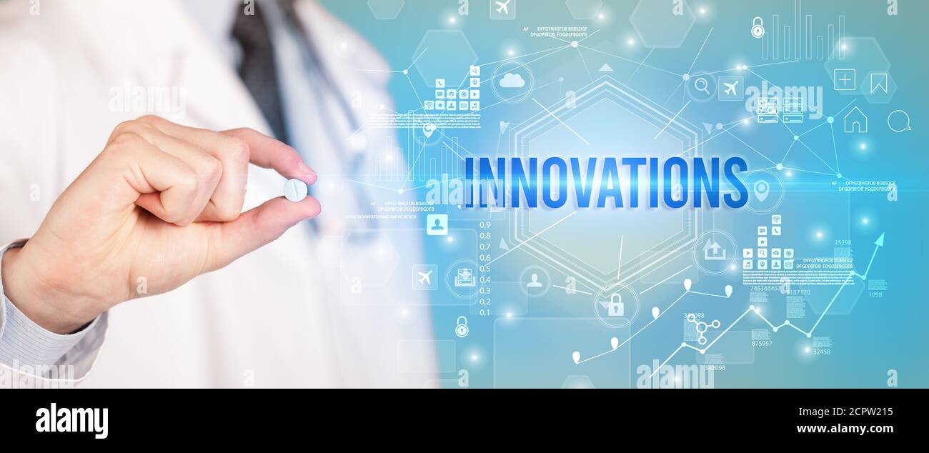 Medico che dà una pillola con ISCRIZIONE DI INNOVAZIONI, concetto di ...