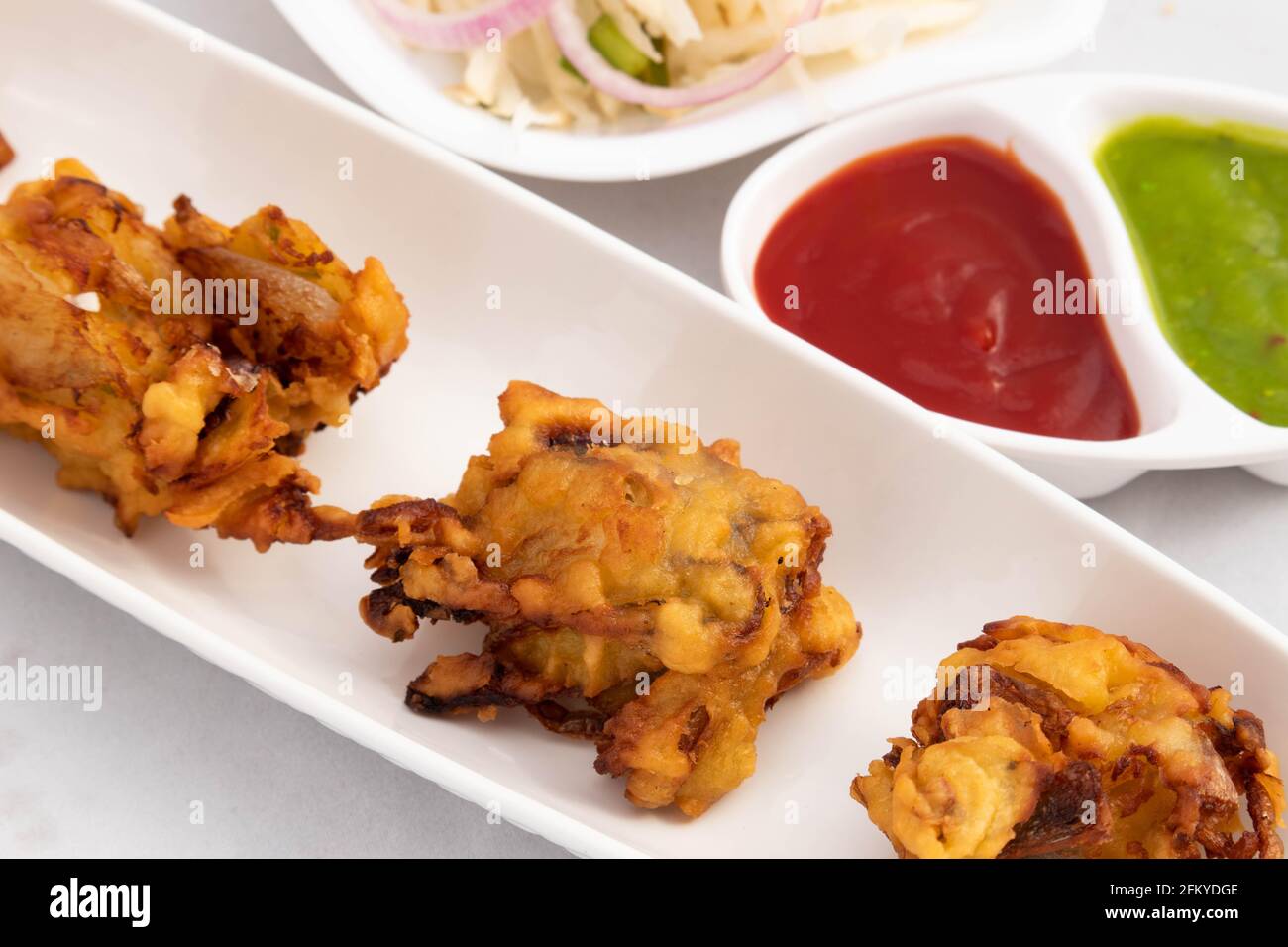Pyaaz ke pakore immagini e fotografie stock ad alta risoluzione - Alamy