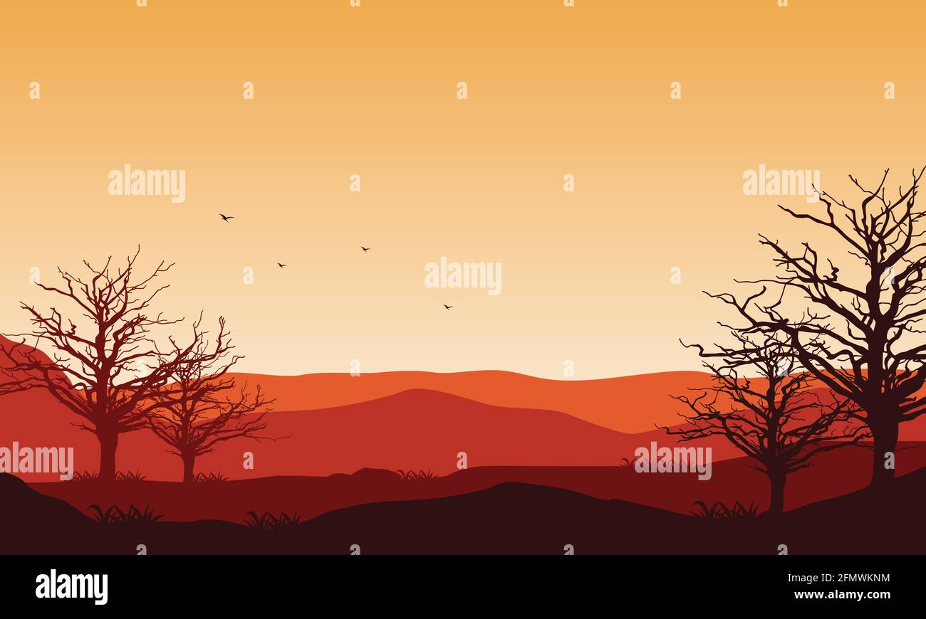 Panorama di montagne e spettacolari sagome di alberi secchi dal deserto ...