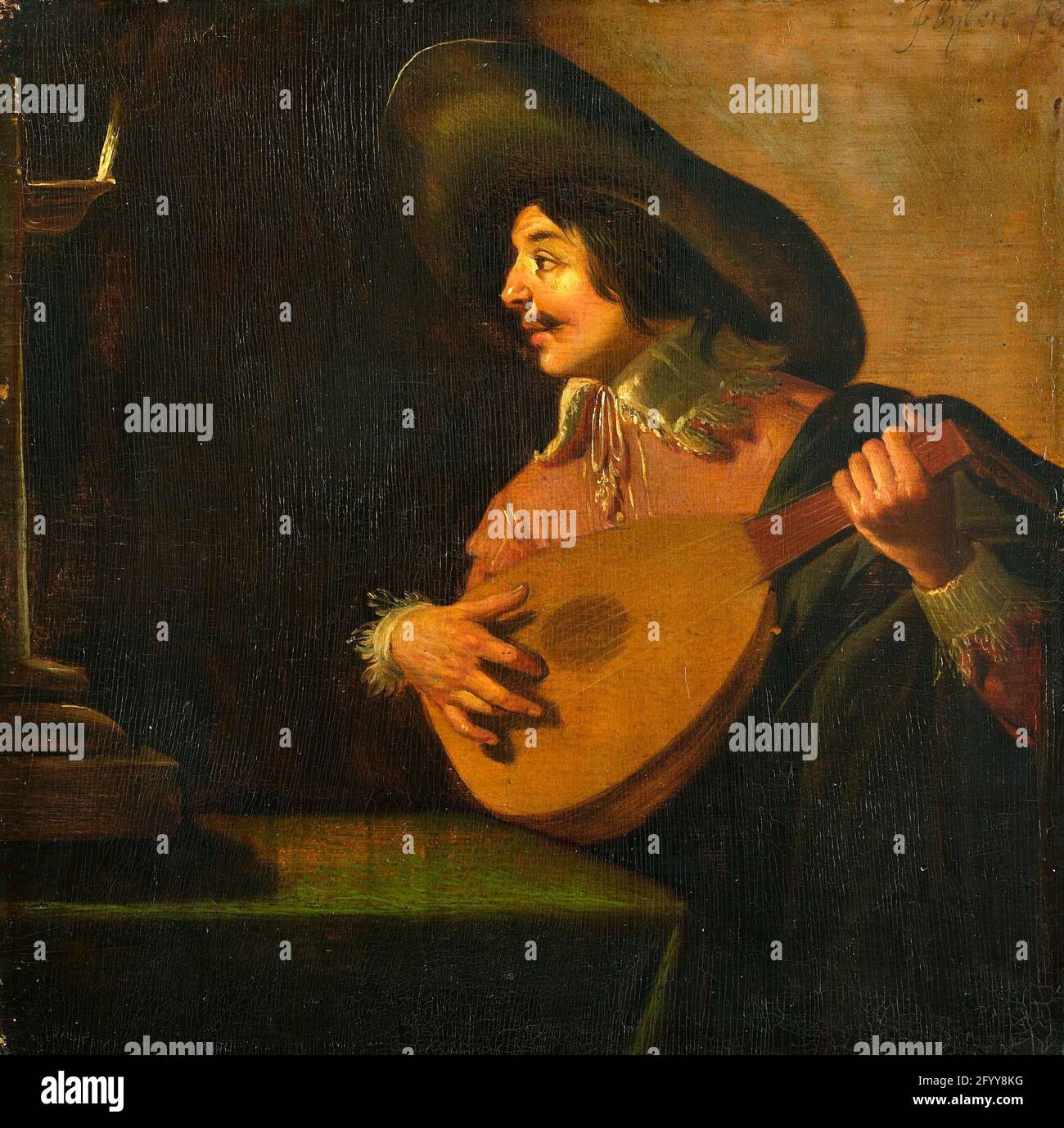 Il lettore Lute. Il lettore di liuto. Uomo con un liuto seduto ad un ...