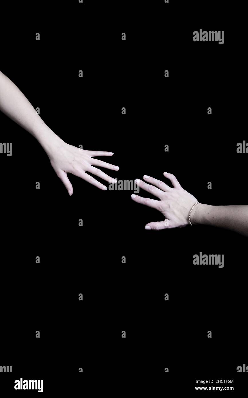 Mani sfondo nero immagini e fotografie stock ad alta risoluzione - Alamy