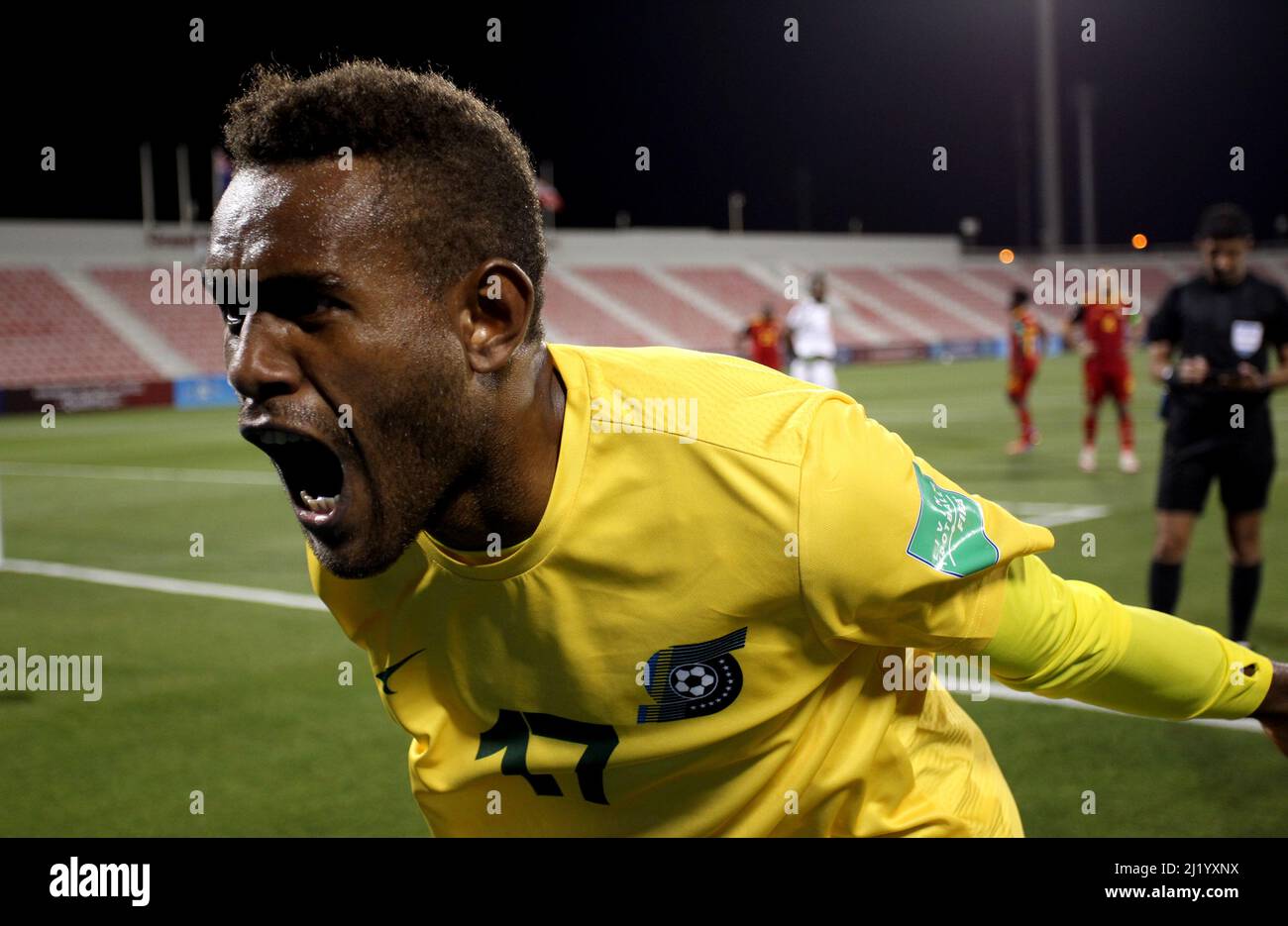 DOHA, QATAR - 27 MARZO: Alvin Hou delle Isole Salomone festeggia con i ...