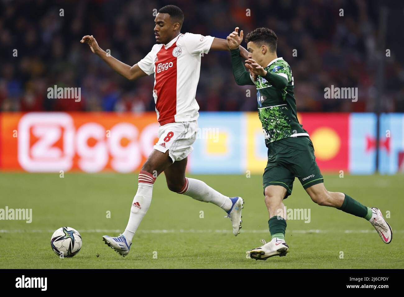 AMSTERDAM - (lr) Ryan Gravenberch di Ajax, Tristan van Gilst o PEC ...
