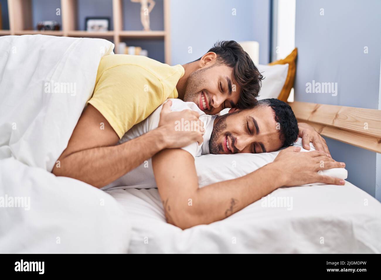 Happy gay couple sleeping together immagini e fotografie stock ad alta ...