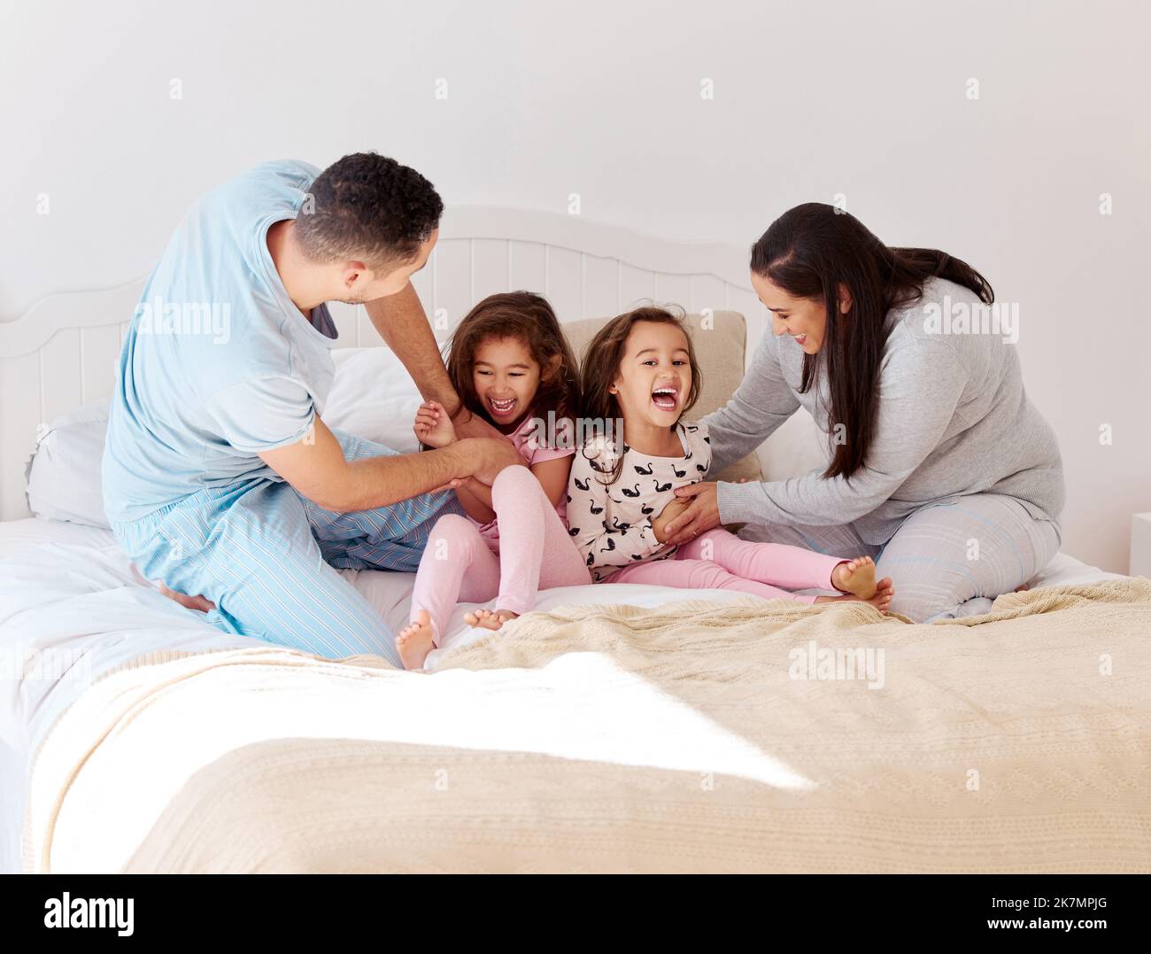 Mother tickling daughters immagini e fotografie stock ad alta ...