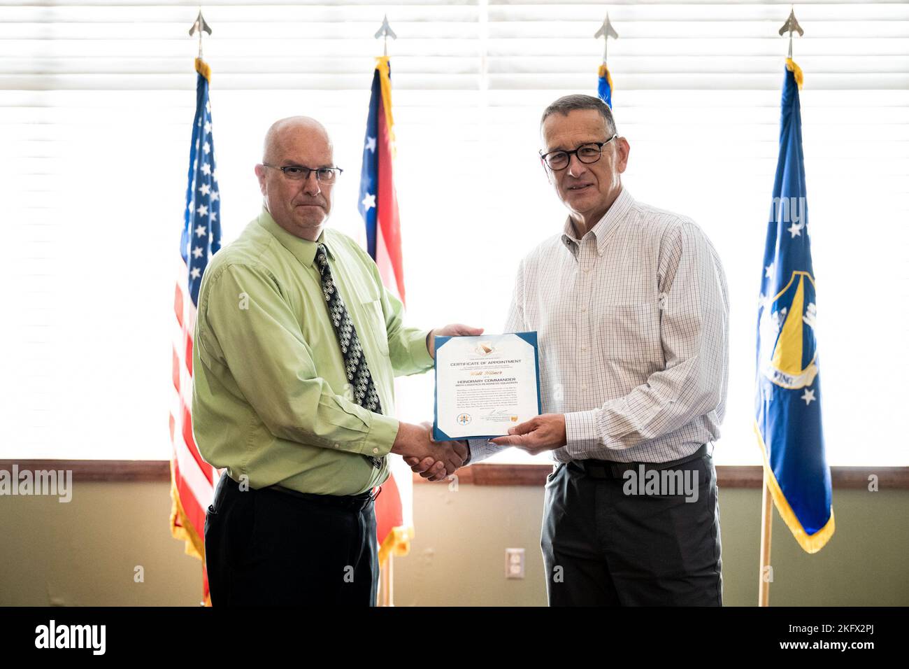 Tom Riste, 88th Logistics Readiness Squadron Commander, induce e ...