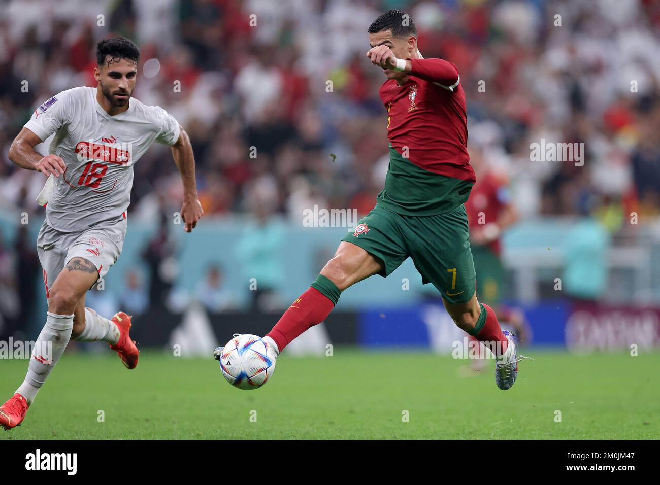 Cristiano Ronaldo del Portogallo e Eray Comert della Svizzera in azione durante la Coppa del ...