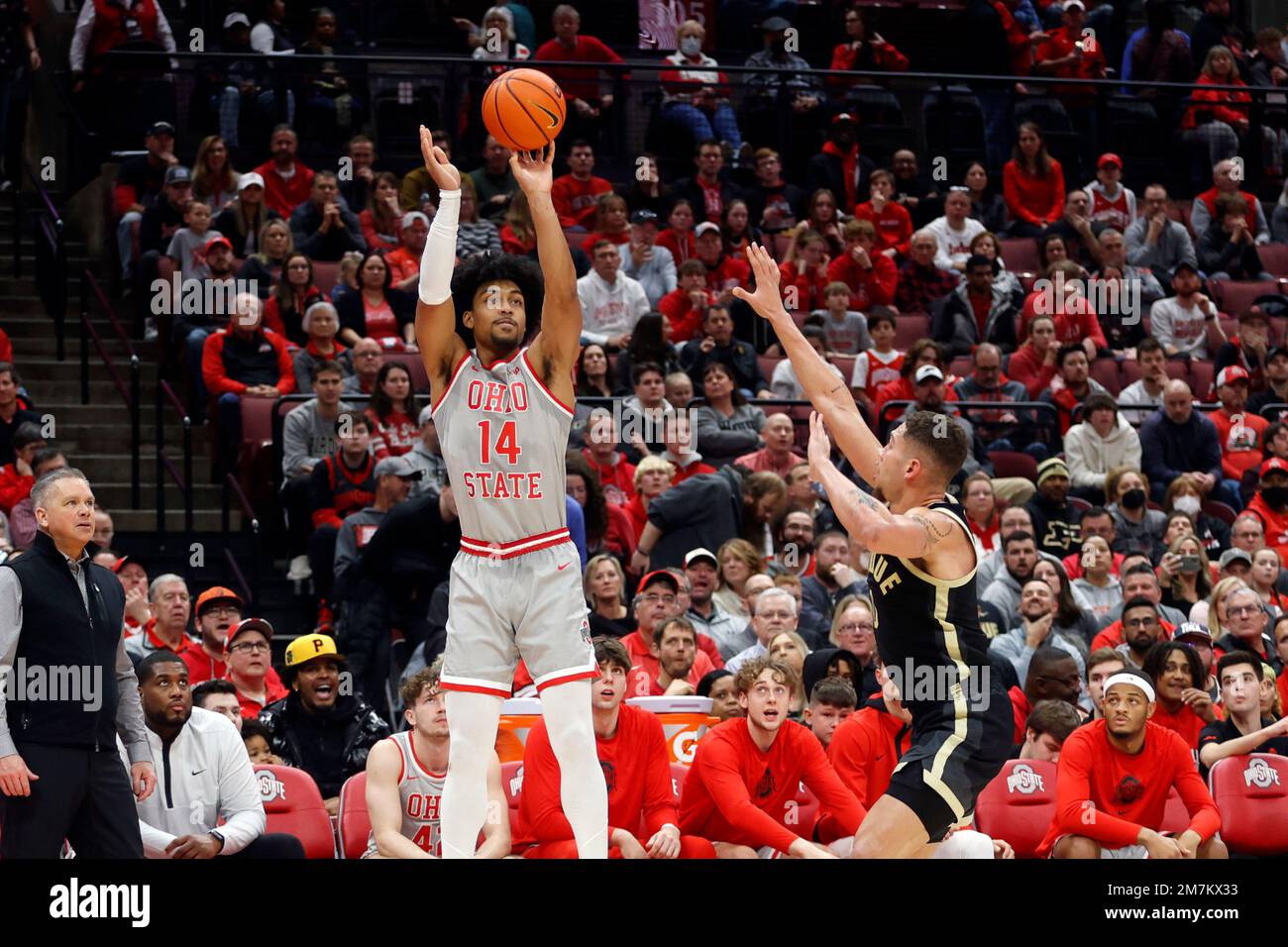 Ohio State forward Justice Sueing, left, shoots in front of Purdue ...