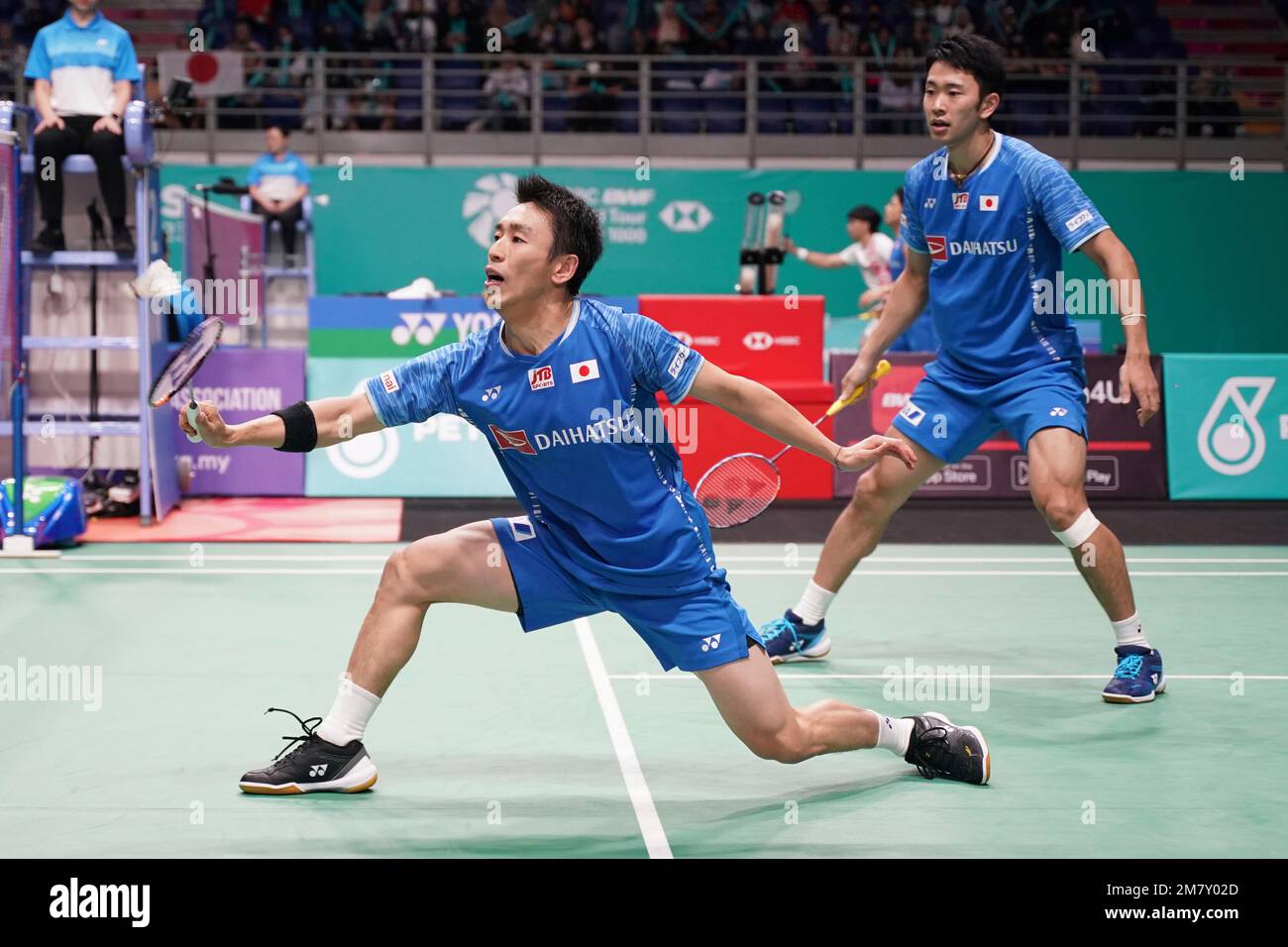 Japan's Keiichiro Matsui, left and Yoshinori Takeuchi plays a shot ...