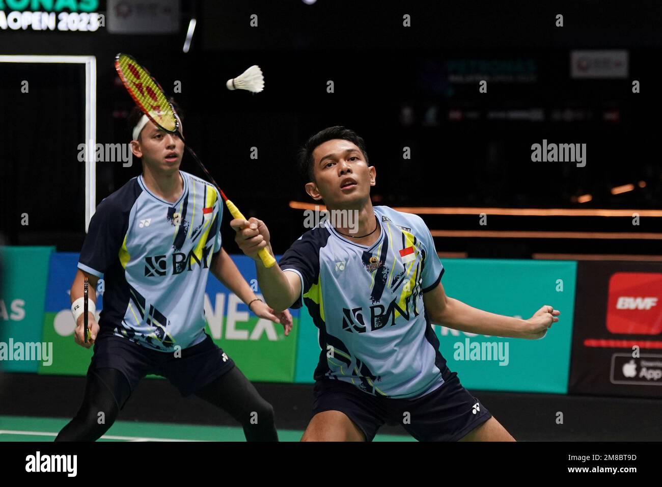 Indonesia's Fajar Alfian, right and Muhammad Rian Ardianto plays a shot ...