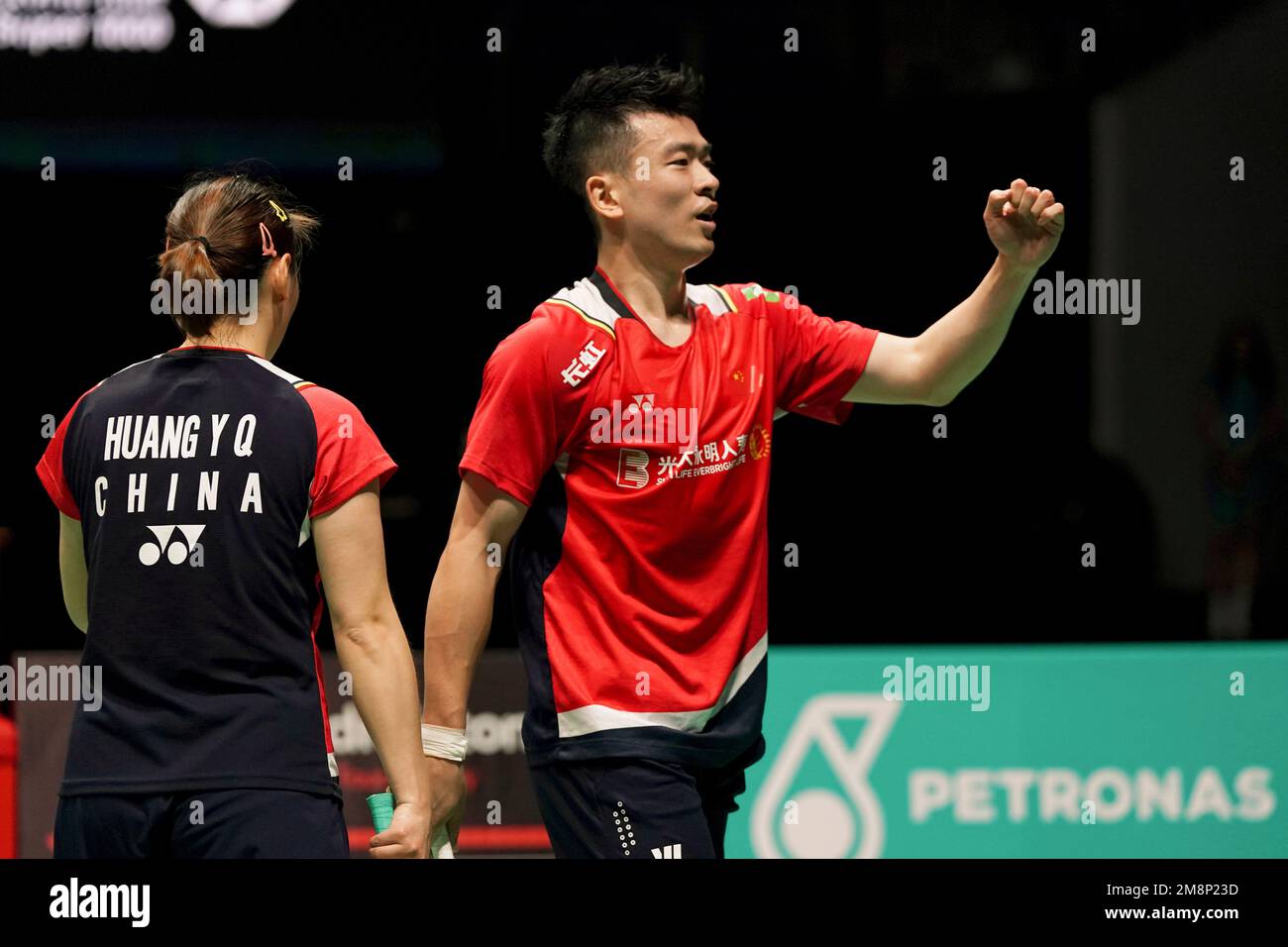 China's Zheng Si Wei, right and Huang Ya Qiong react during their mixed ...