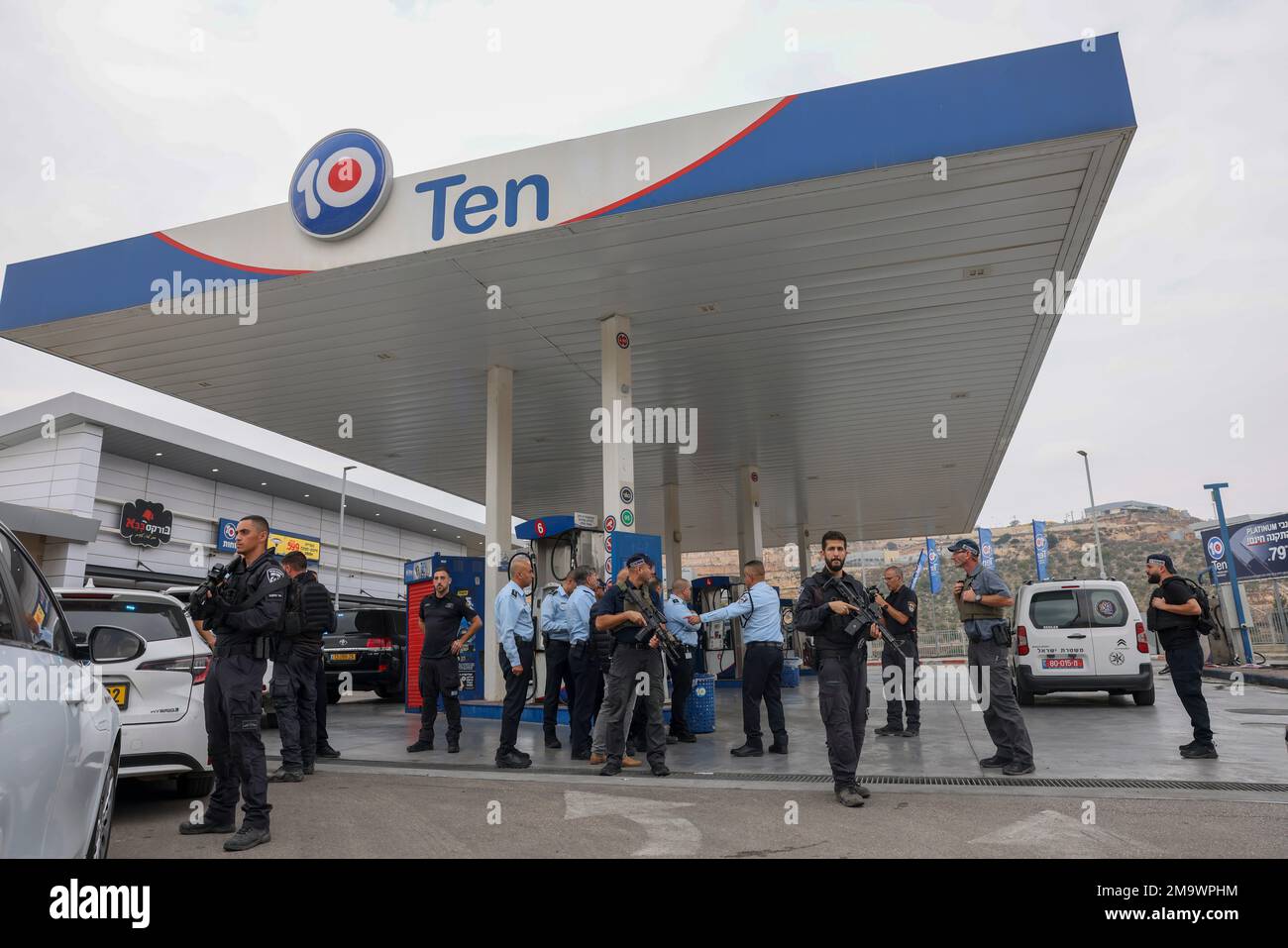 Israeli police inspect the scene of an attack at the Ariel Industrial ...