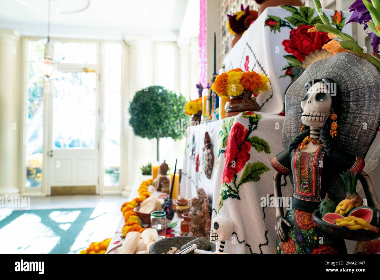 An ofrenda to celebrate Dia De Los Muertos, is displayed in the Palm ...