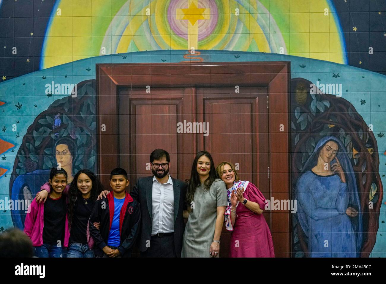 Chilean President Gabriel Boric, center, his wife first lady Irina ...