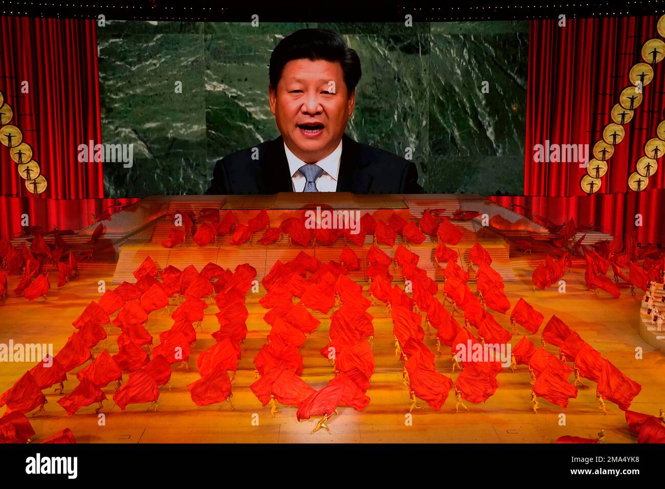 FILE - Chinese President Xi Jinping is displayed on a screen as ...