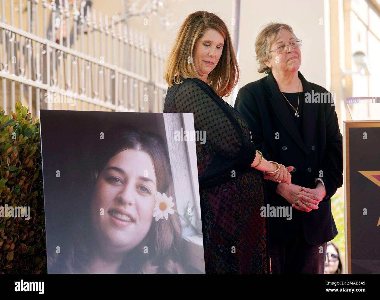 Owen Elliot-Kugell, center, daughter of the late singer "Mama" Cass ...