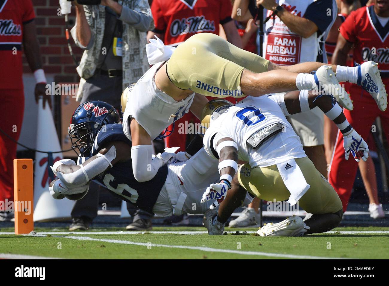 Mississippi running back Zach Evans (6) dives for a touchdown past Tulsa cornerback Tyon Davis ...