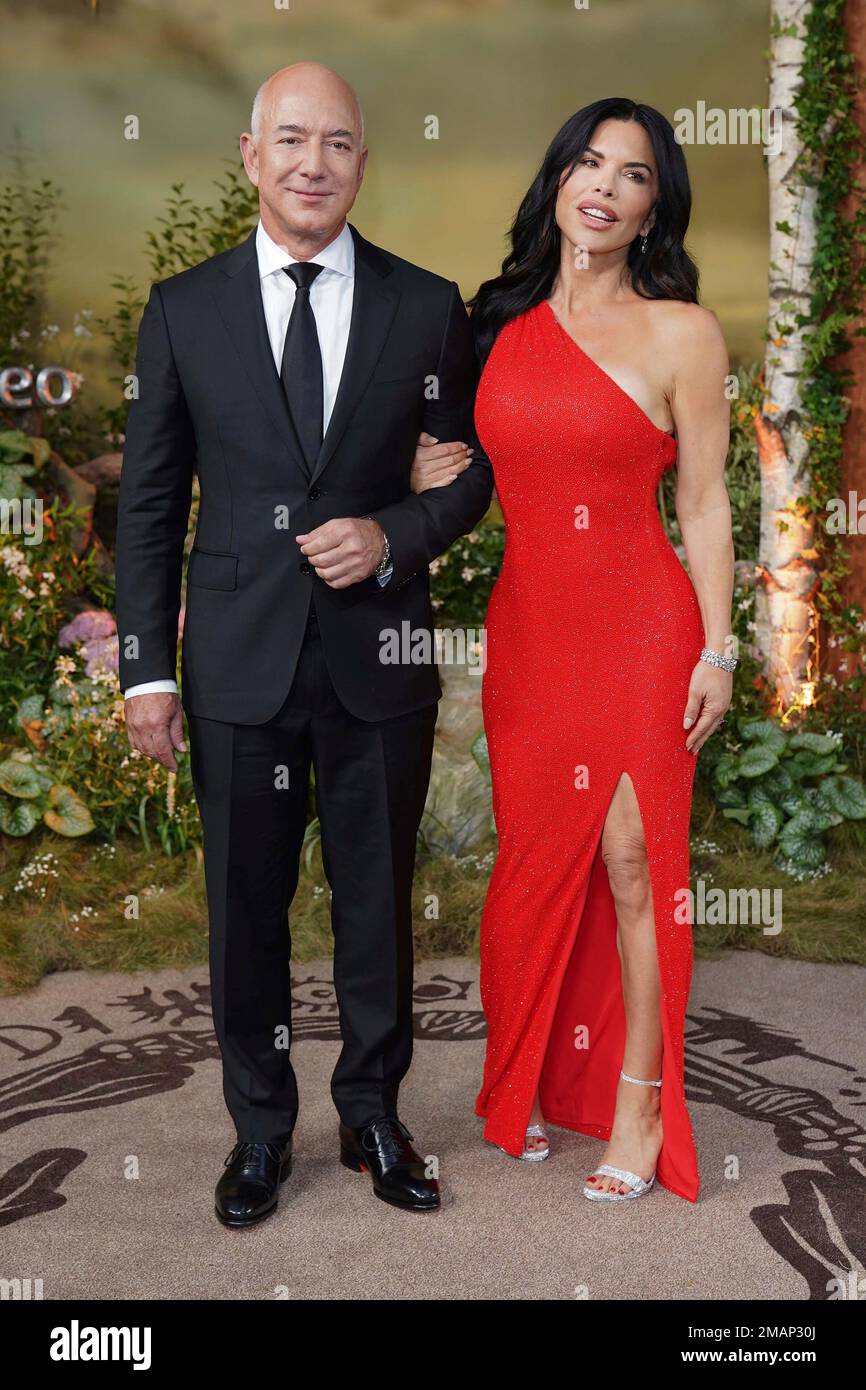 Jeff Bezos, left, and Lauren Sanchez pose for photographers upon their ...