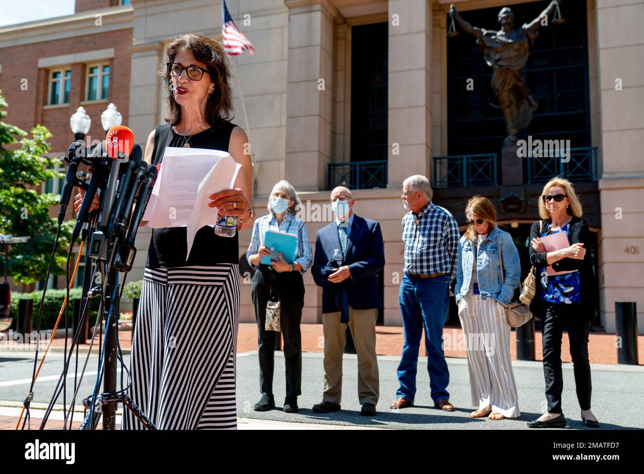 Diane Foley, mother of James Foley, foreground, accompanied by from ...