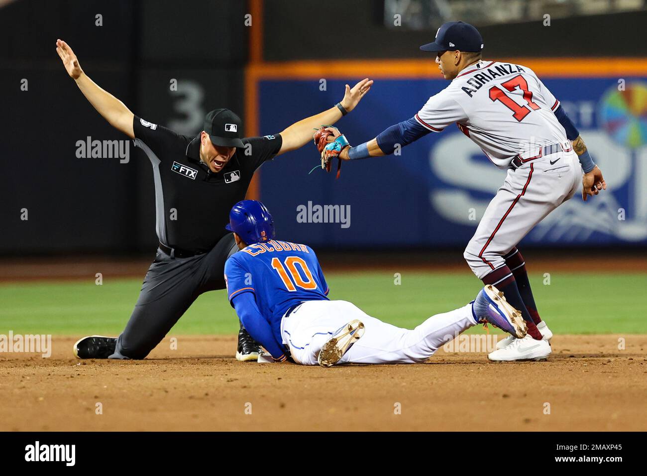 New York Mets' Eduardo Escobar (10) is ruled safe at second base after ...