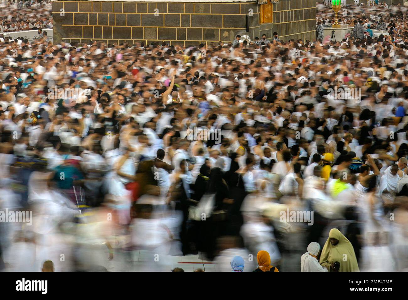 In this photo taken with low shutter speed, Muslim pilgrims ...