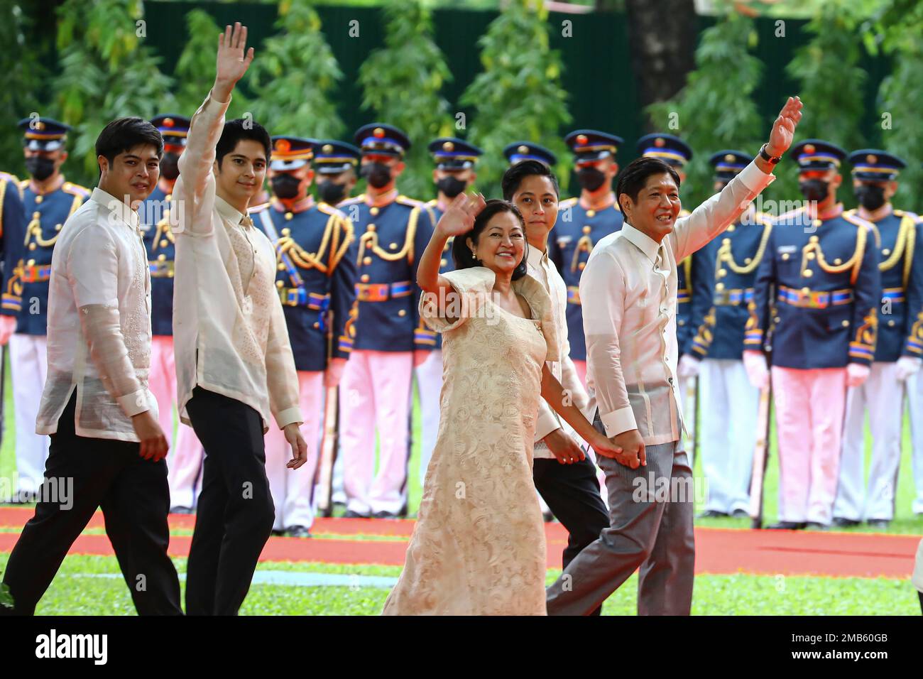 Philippine President Ferdinand Marcos Jr., right, waves with his family ...