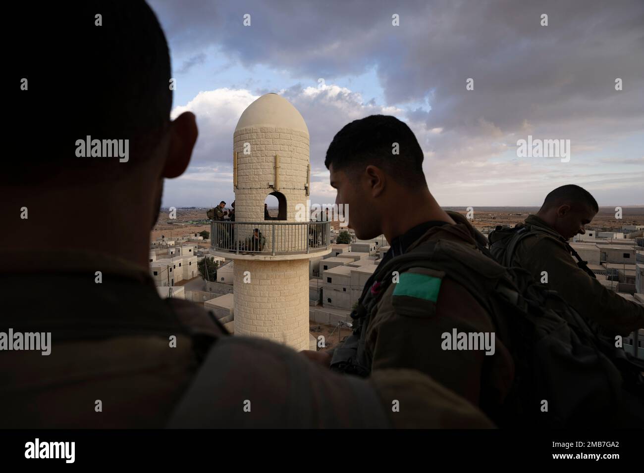 Israeli soldiers take positions on top of a mock minaret of a mosque ...