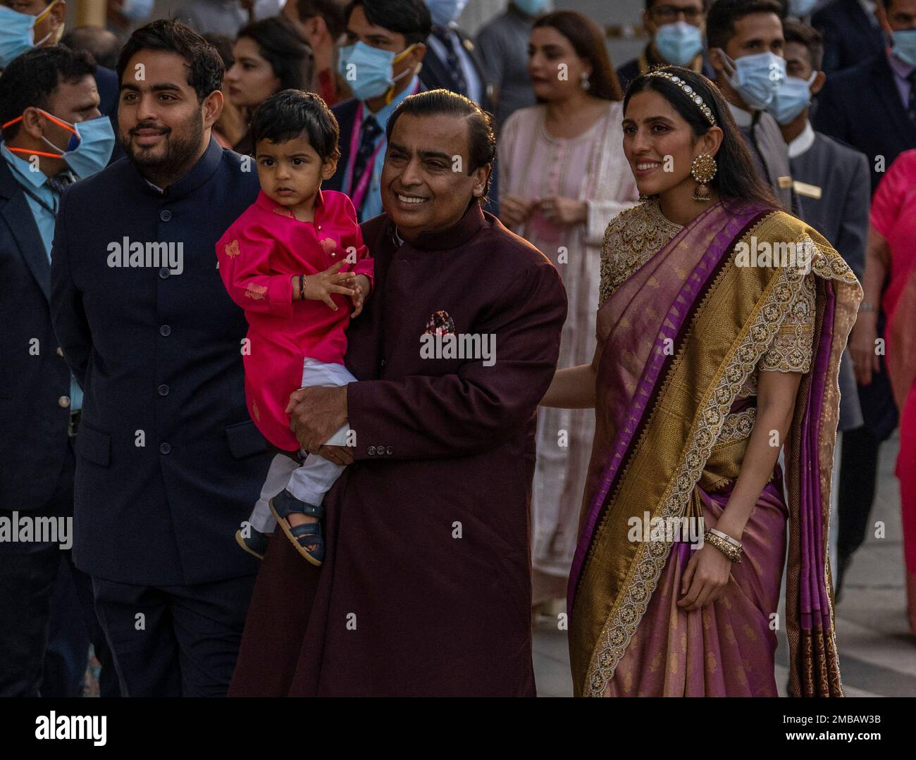 Reliance Industries Limited Chairman Mukesh Ambani carries his grandson ...