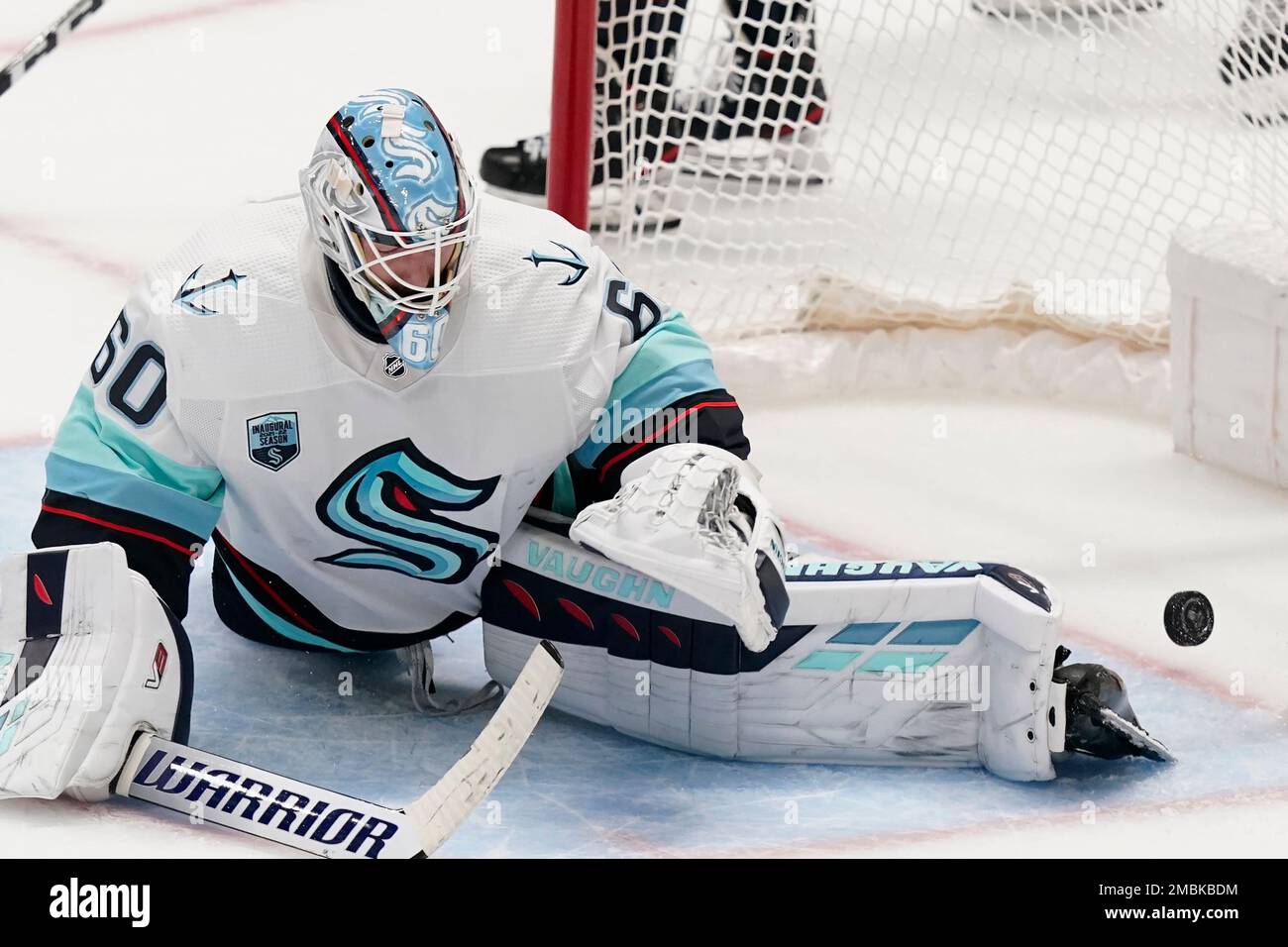 Seattle Kraken goaltender Chris Driedger (60) allows a goal by Dallas ...