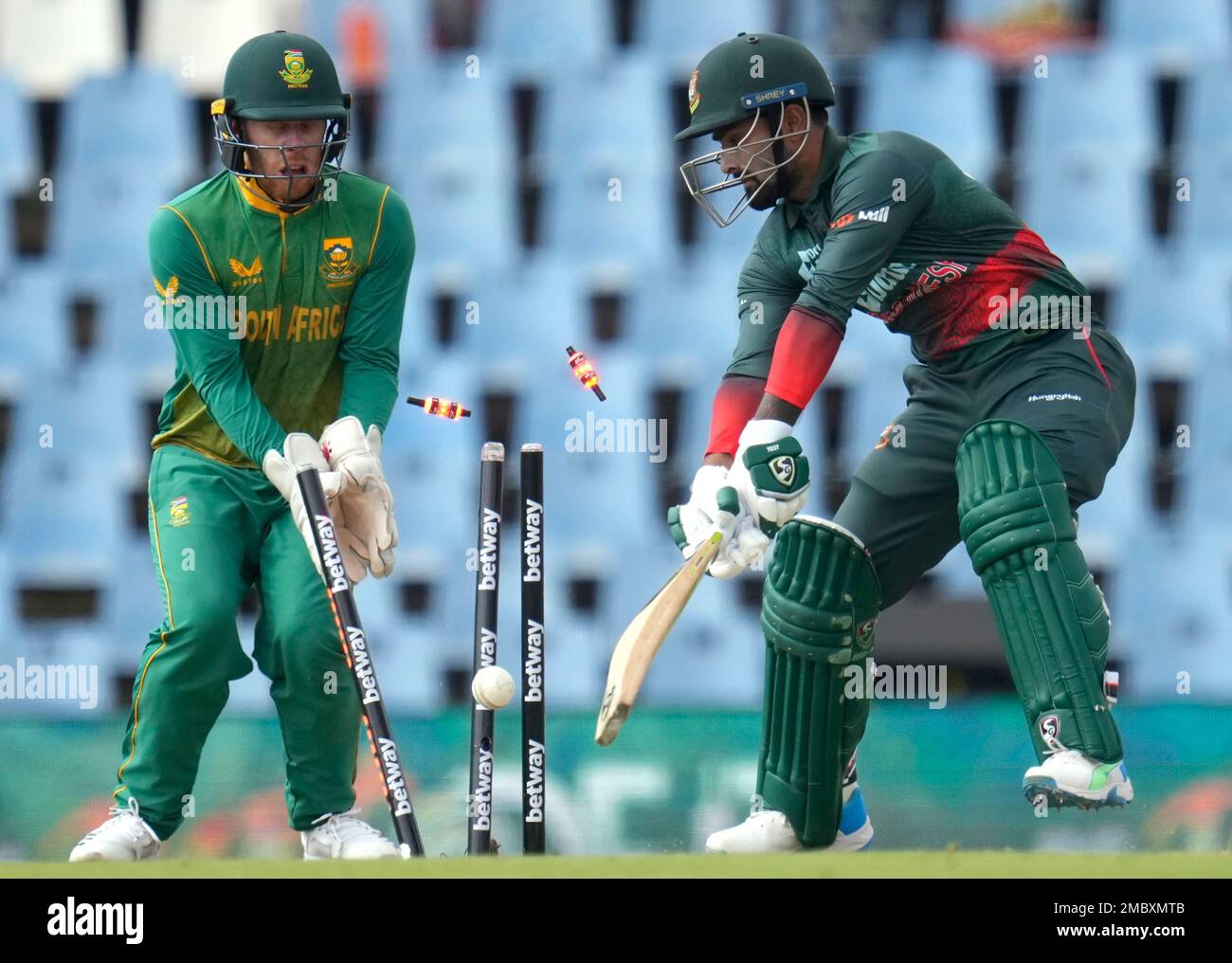 Bangladesh's batsman Litton Das, right, is bowled by South Africa's ...