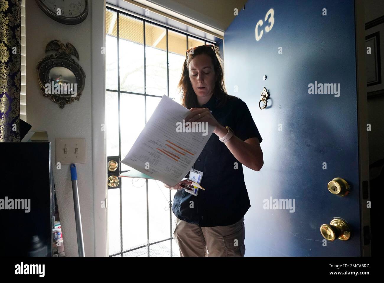 FILE - Pima County Constable Kristen Randall speaks to a rental ...