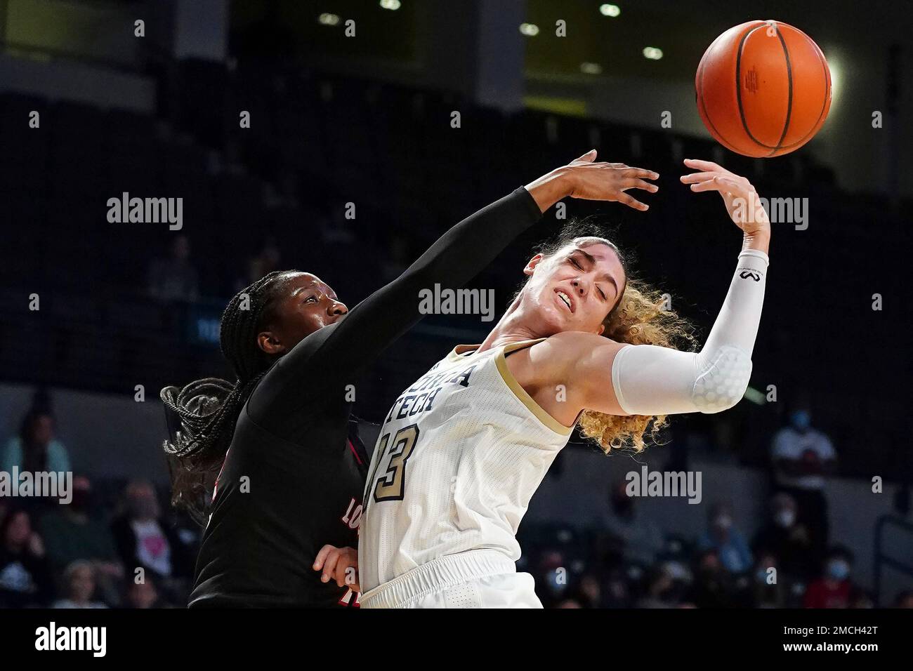 Georgia Tech forward Lorela Cubaj (13) and Louisville forward Liz Dixon ...