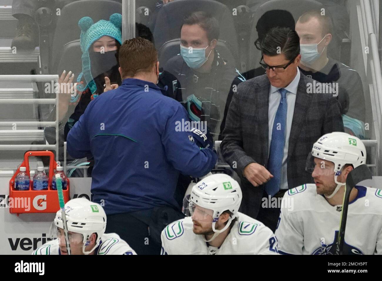Seattle Kraken fan Nadia Popovici, upper left, gestures toward ...
