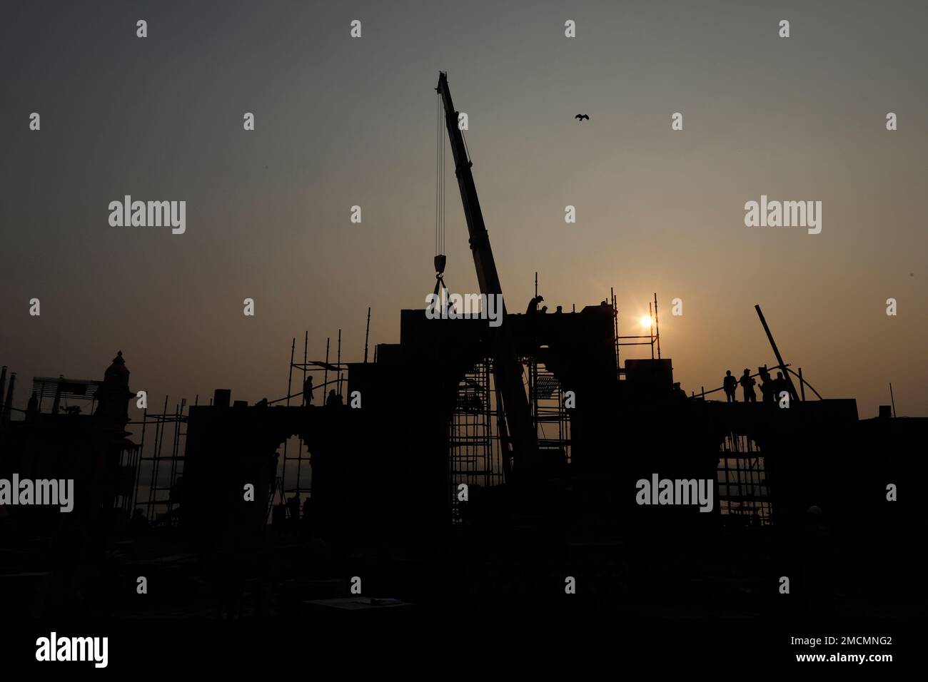 Laborers work at the under-construction Kashi Vishwanath Dham Corridor ...